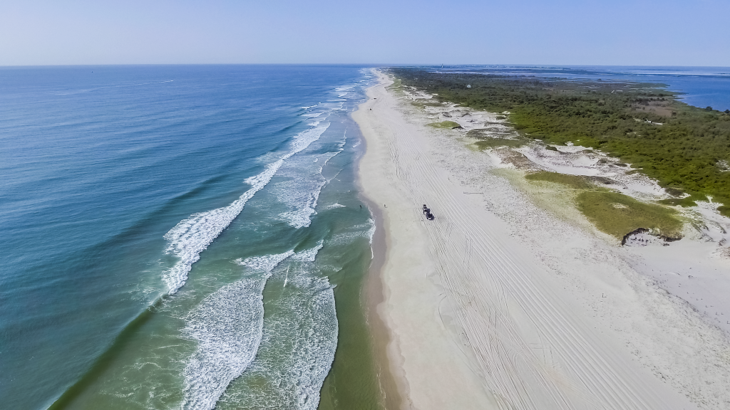 Stripers on Clams in the Summer Surf - On The Water
